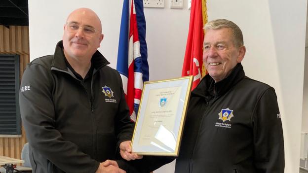 West Yorkshire firefighter celebrates 50 years in the service - BBC News