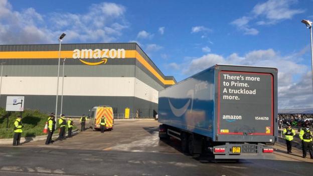Amazon protests: 31 arrested as Extinction Rebellion targets retailer ...