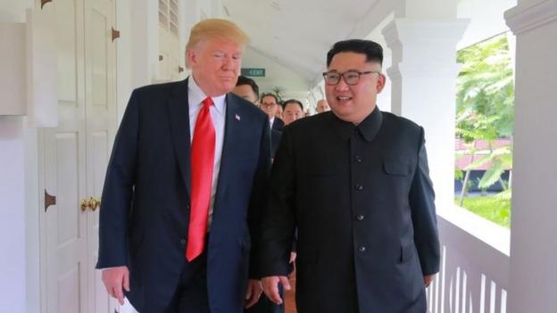 Newspaper headlines: May escapes defeat and 'wins the day' - BBC News