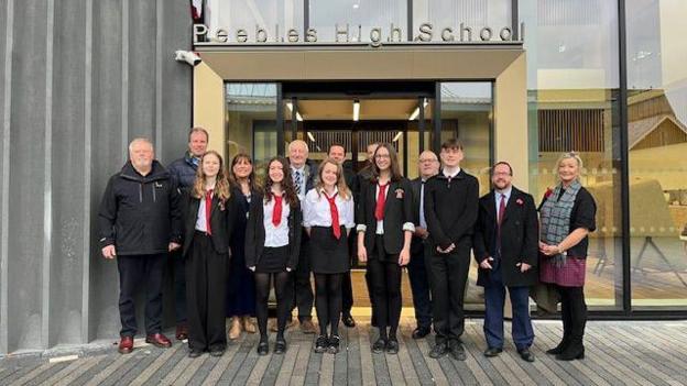 Fire-hit Peebles High School's replacement opens its doors - BBC News
