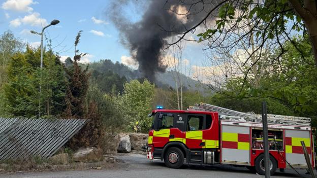 Fire crews tackle blaze at derelict Sheffield Ski Village - BBC News