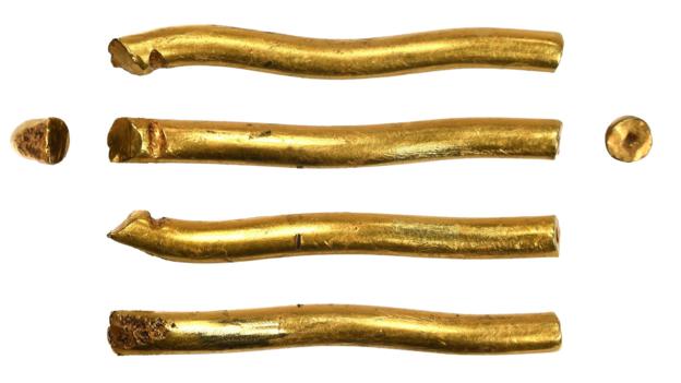 Gold rod found in Derbyshire field declared as treasure by court - BBC News