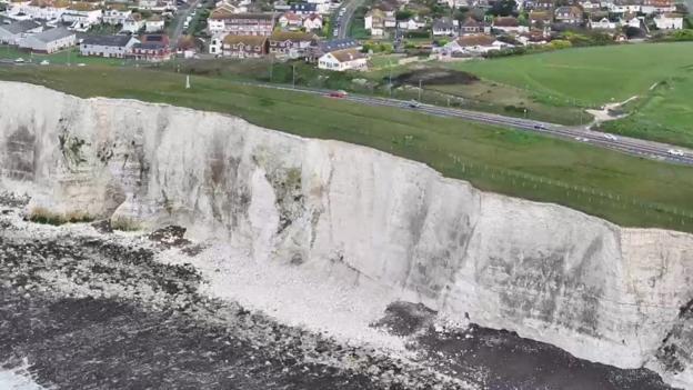East Sussex: Alert after cliff collapse caught on camera - BBC News