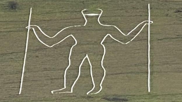 Long Man of Wilmington: Chalk carving repainted by volunteers - BBC News