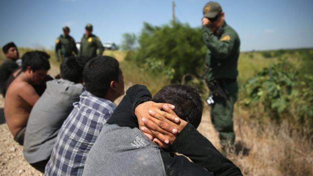 Hillary Clinton calls for end to 'divisive' deportation raids - BBC News