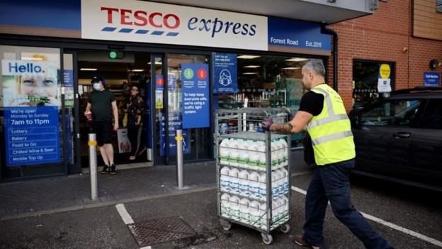 Tesco vows to rein in prices as profits treble - BBC News