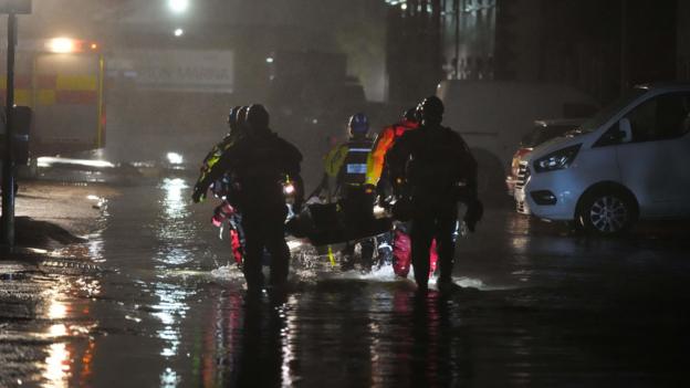 Flood warnings remain after chaos caused by gales and high tides - BBC News