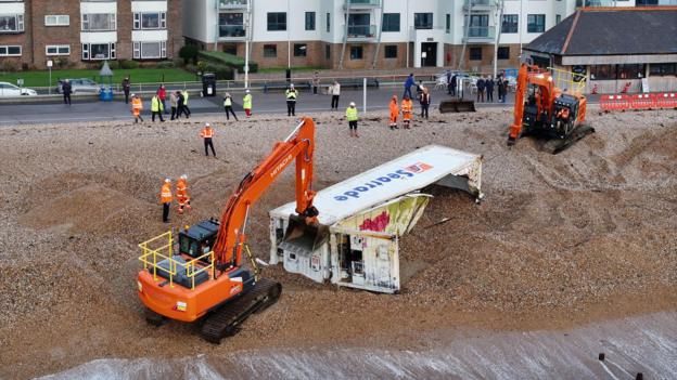 Why are chips washing up on a Sussex beach? - BBC News