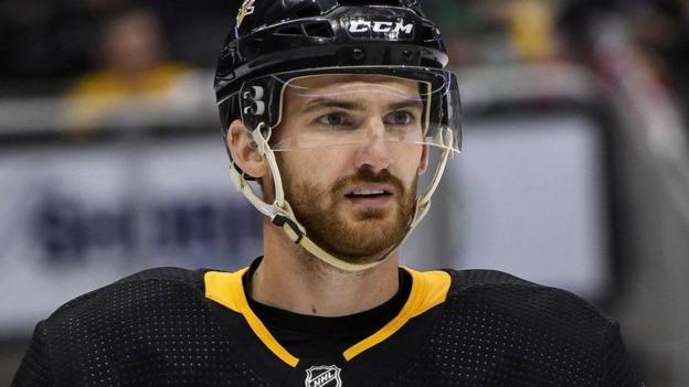 Man re-bailed over ice hockey player's death - BBC News