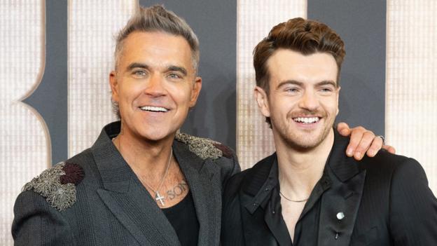 Who provides Robbie Williams singing voice in Better Man film? - BBC News