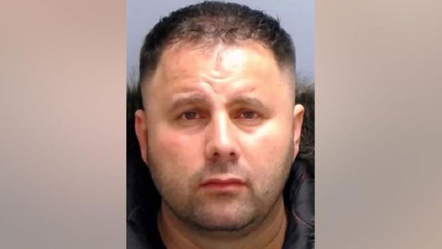 The fugitive 'people smuggler' wanted over football club fraud - BBC News