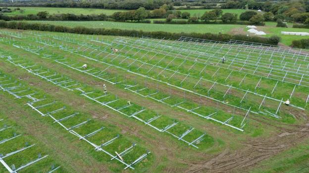 Work starts on 70,000-panel solar farm near Holsworthy - BBC News