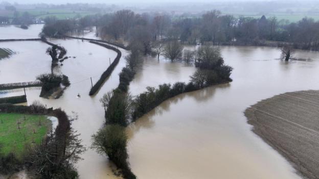Flood warnings remain in place across West and East Sussex - BBC News