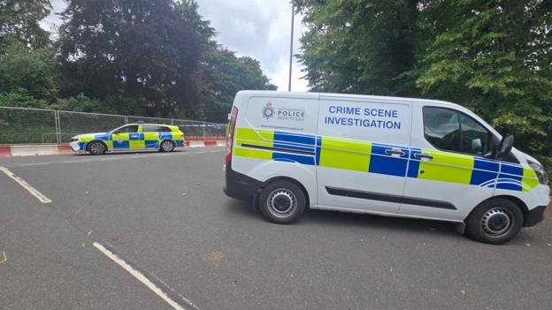 Three in hospital after cars and e-bikes crash on A52 - BBC News