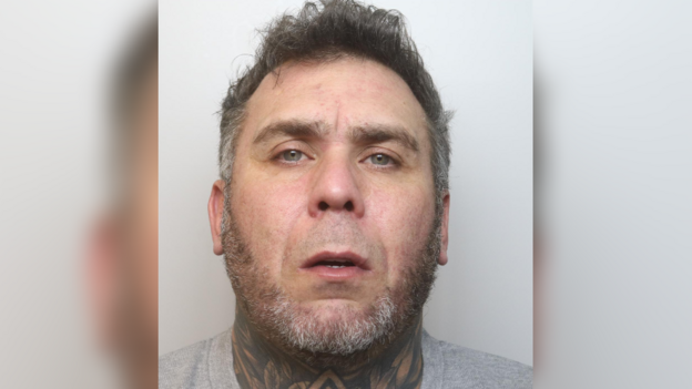 Swindon clown-masked blackmailer with imitation gun jailed - BBC News