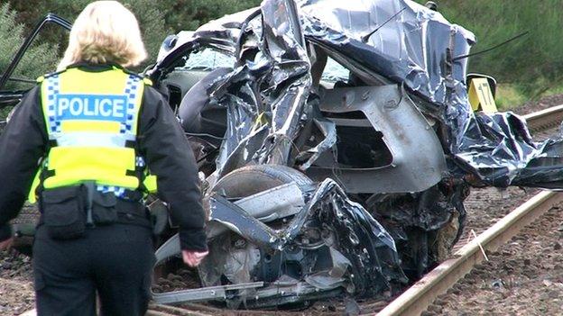 Dunragit crossing crash driver Andrew Robertson 'improving' - BBC News