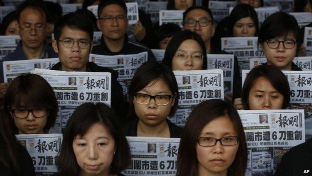 Hong Kong news editor Kevin Lau improving after attack - BBC News