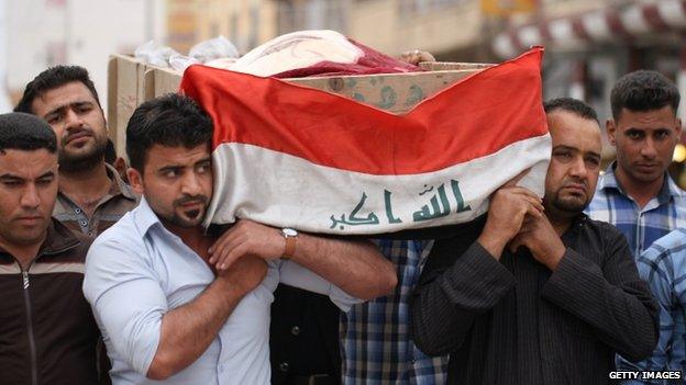 Iraq bomb attack kills at least 32 at Hilla checkpoint - BBC News