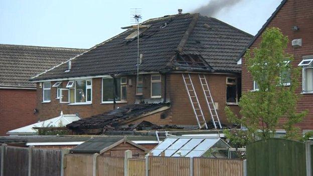 Garforth fatal house blaze investigation under way - BBC News
