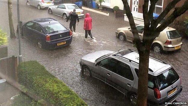 Heavy rain causes flash flooding in Norwich - BBC News