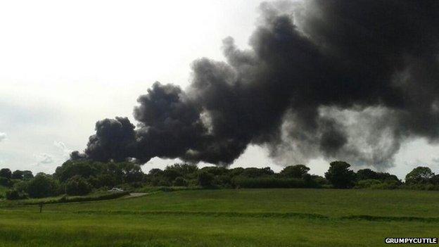 Brixham ex-holiday park fire: Five teenagers arrested - BBC News