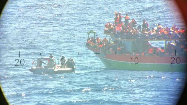 A boat loaded with migrants in the middle of the Mediterranean - 20 June 2014