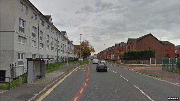 Woman, 23, dies after Rochdale flat 'smoking' fire - BBC News