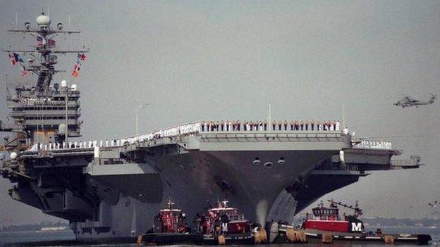 Navy warship USS Theodore Roosevelt arrives in Solent - BBC News