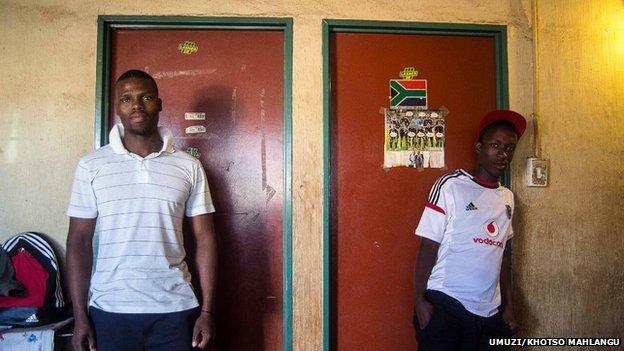 Inside South Africa's 'dangerous' men's hostels - BBC News