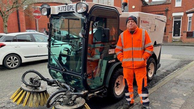 Manchester road sweeper keeps streets safe and tidy for 43 years - BBC News