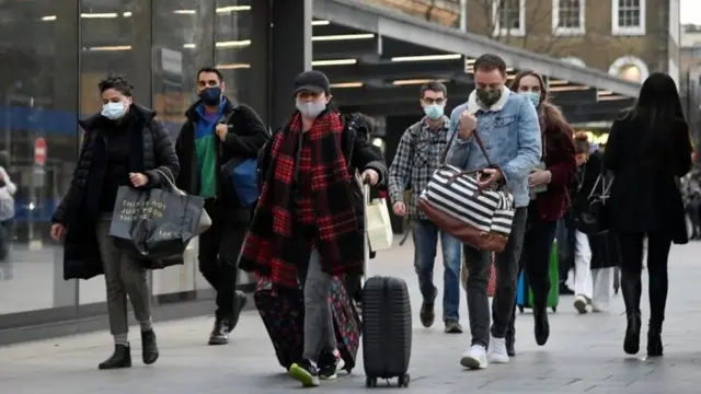 UK hit by travel bans as Christmas Covid lockdown starts - BBC News