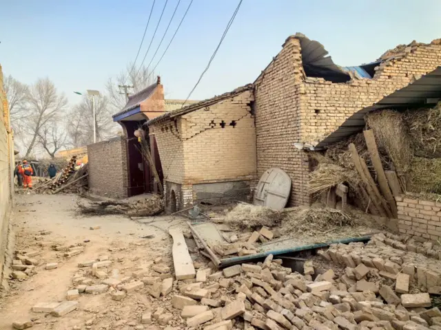 Rescuers brave freezing temperatures as China quake kills more than 100 ...