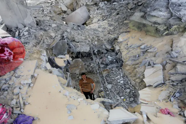 IDF admits 'extensive collateral damage' in Gaza camp strike - BBC News