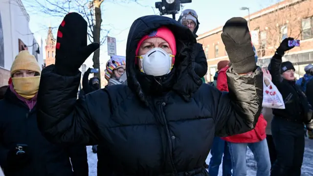 Protesters gather in Minneapolis as governor calls on Trump to remove ...