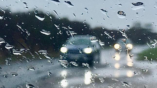 Firefighters rescue van driver stuck in East Sussex flooding - BBC News