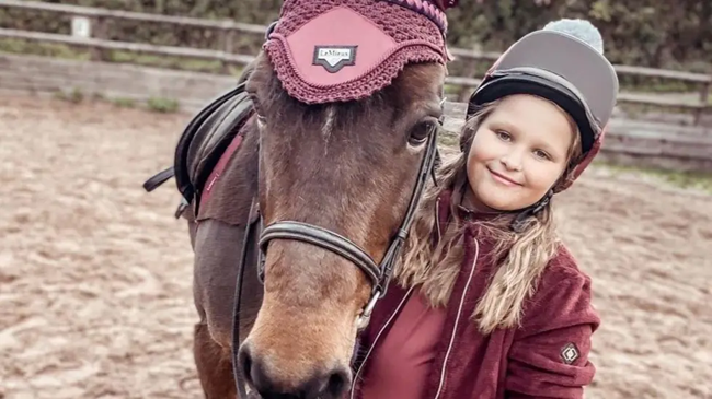 Family of Mia Lucas, 12, welcomes new brain disorder guidance - BBC News