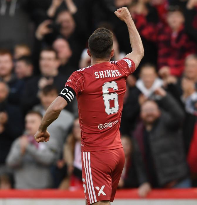 Shinnie 'back where he belongs' - BBC Sport