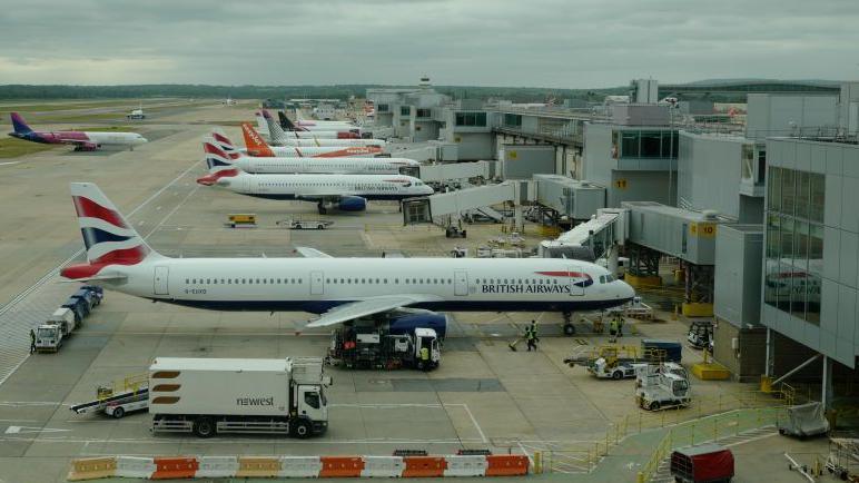 Gatwick Airport profits hit by drop in short-haul passengers - BBC News
