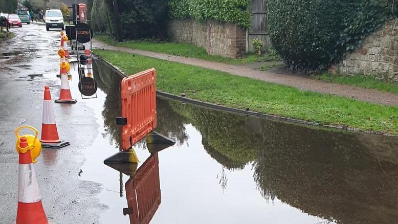 'Scary' flooding hits assisted living residents near Chichester - BBC News