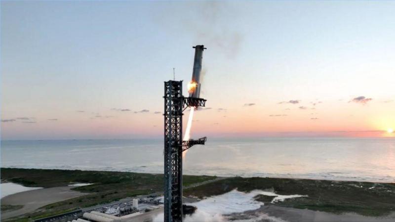 Space X: Rocket booster caught in mid-air for the first time - BBC ...