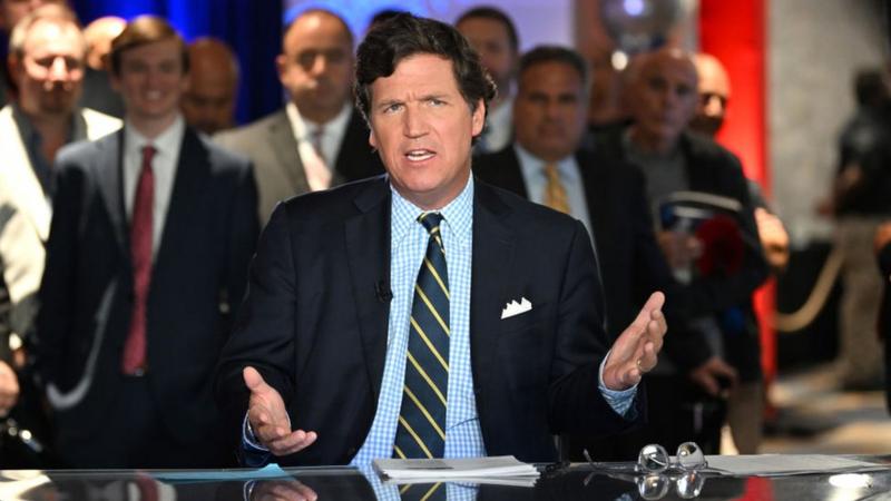 Who is Tucker Carlson, the man interviewing Vladimir Putin? - BBC News