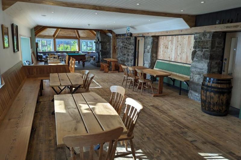Britain's remotest mainland pub The Old Forge reopens after revamp ...