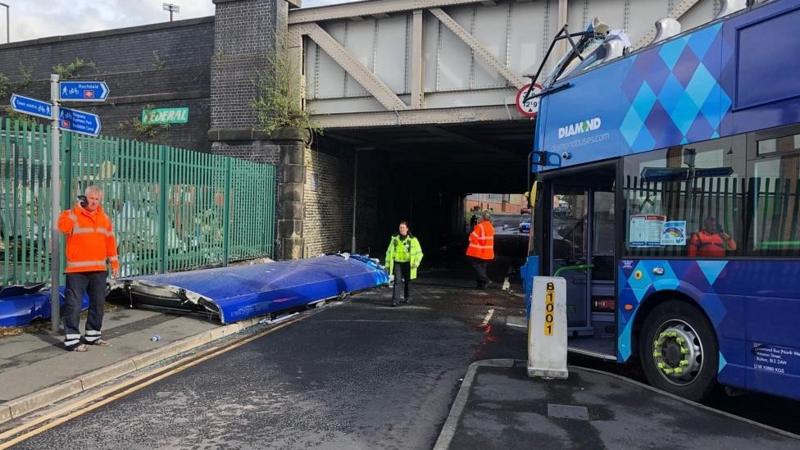Rochdale bus crash: Nine hurt in bridge crash - BBC News