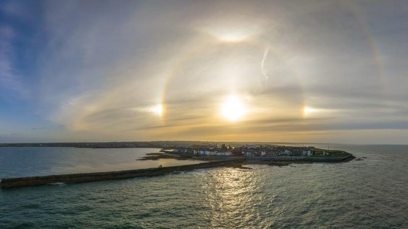 Sun halos, arcs and upside-down rainbows seen across England - BBC News