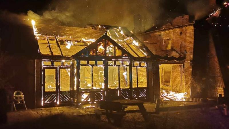 The Crooked House: Fire rips through famed 'wonky' pub - BBC News