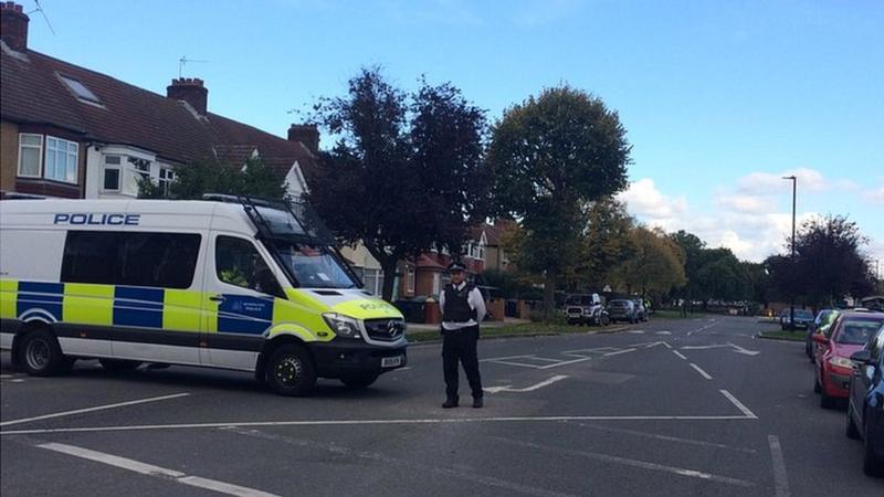 Northolt armed stand-off ends as police enter house - BBC News