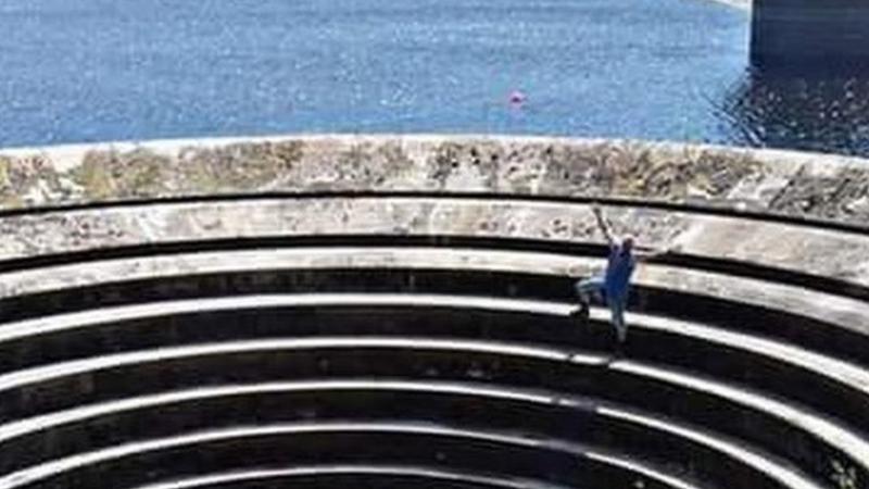 Ladybower Reservoir's overflowing 'plug holes' attract photographers ...