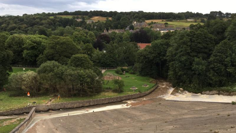 Whaley Bridge dam wall collapse in pictures - BBC News