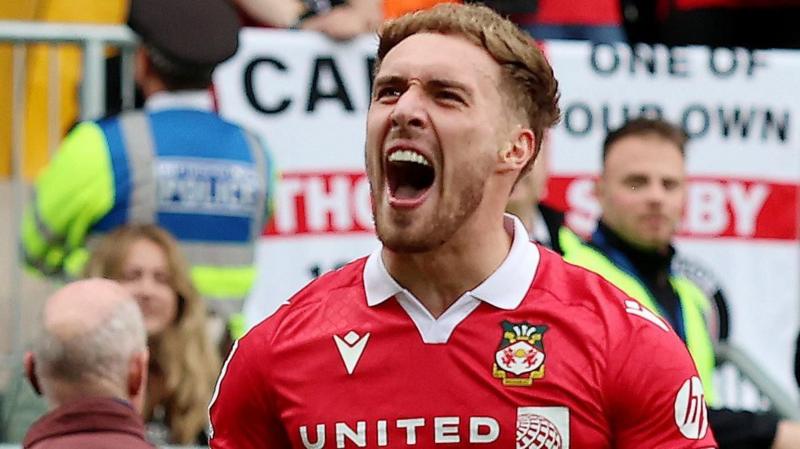 Wrexham AFC: Hollywood stars and fans celebrate historic promotion - BBC News