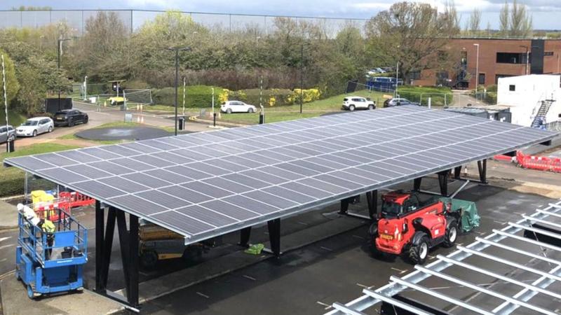 Why car parks are the hottest space in solar power - BBC News